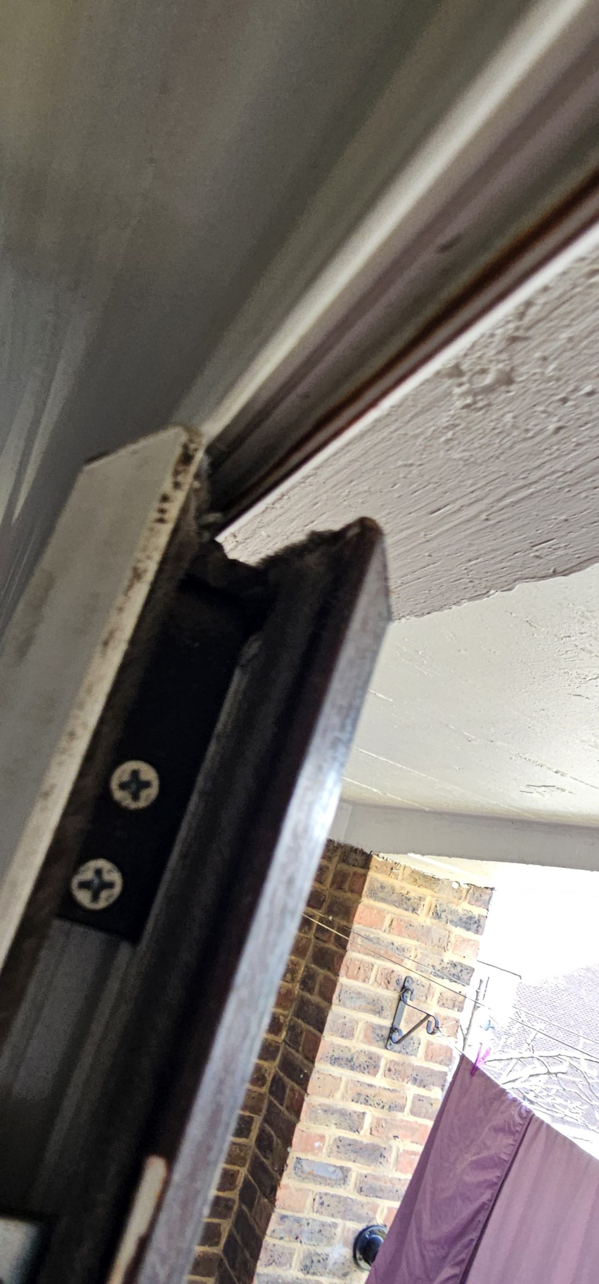 A sliding door Damaged tracks in Isle of dogs - Sliding Balcony and ...